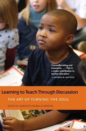 Learning to Teach Through Discussion